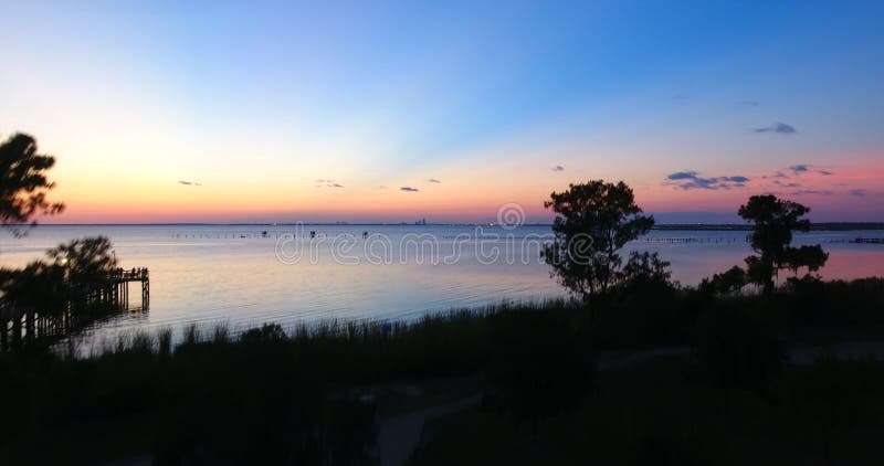 Bay sunset 4 stock image. Image of sunset, water, blue - 89947017