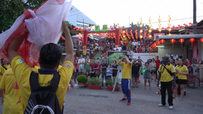Chingay Performance Pole of Big Flag Balancing at Head. Stock Footage ...
