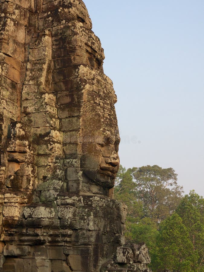 Bayon faces in Angkor stock image. Image of sculpture - 29368159