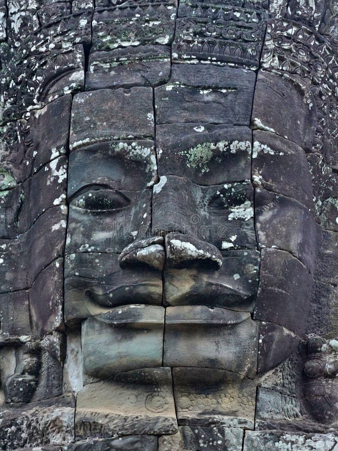 Bayon faces in Angkor stock image. Image of sculpture - 29377689