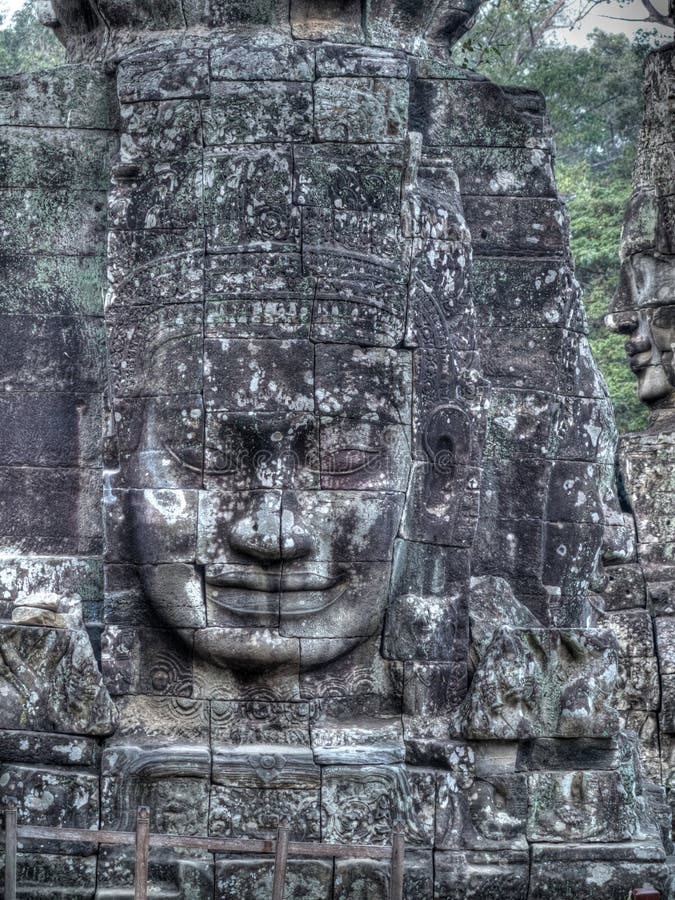 Bayon faces in Angkor stock image. Image of bayon, face - 29377707