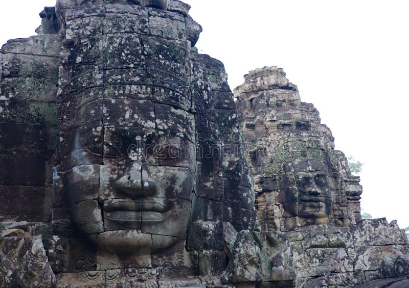 Bayon faces in Angkor stock image. Image of cambodia - 29377713