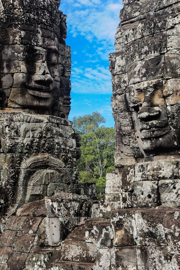 Bayon faces in Angkor stock image. Image of sculpture - 29377689