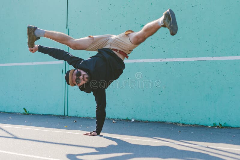 BBOY Dancing Breakdance Against a Blue Wall Stock Photo - Image of ...