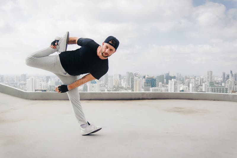Bboy Doing Some Stunts. Street Artist Breakdancing Outdoors Stock Photo ...
