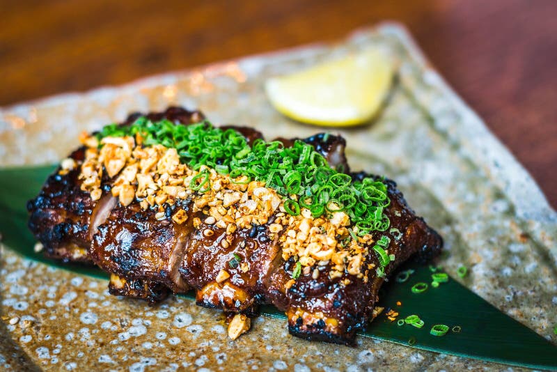 BBQ Beef Ribs with Glazing and Peanuts and Chopped Spring Onions Stock ...