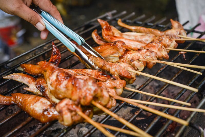 BBQ Chicken Legs Getting Turned Over on the Bbq Stock Image - Image of ...