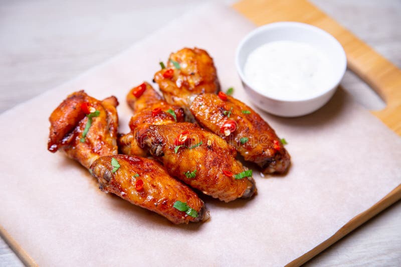 BBQ Chicken Wings with Sauce on Paper. Stock Image - Image of chicken ...