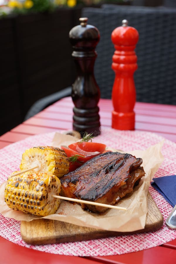 BBQ Dish Served on Restaurant Table Stock Image - Image of platter ...