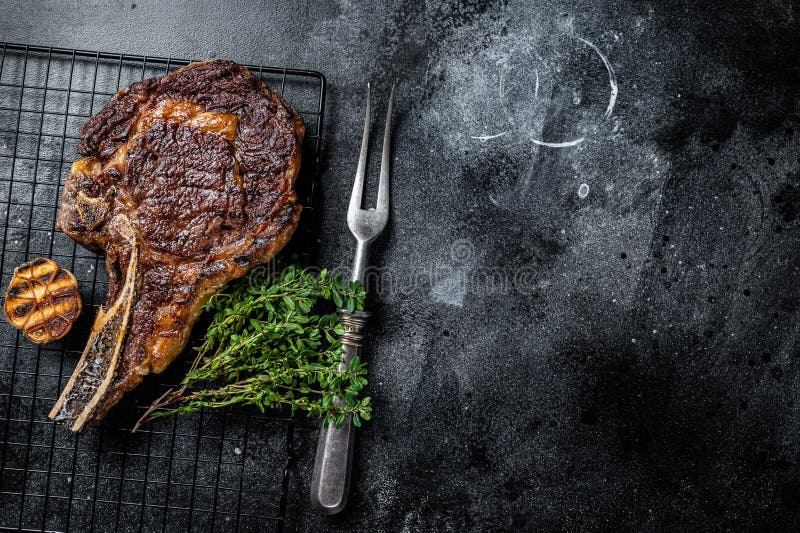 BBQ Grilled Tomahawk or Rib Eye with Bone Beef Steak. Black Background ...
