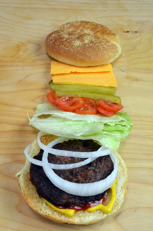 BBQ Hamburger with Traditional Toppings Stock Photo - Image of board ...