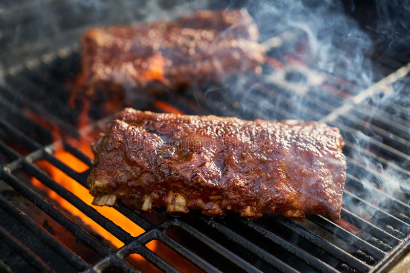 Cooking Barbecue Pork Ribs On A Grill Stock Image - Image of fresh ...