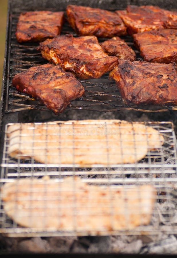 BBQ Ribs and Fish on Grill with Charcoal Stock Photo - Image of grilled ...