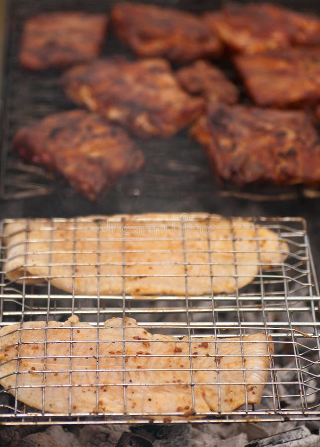 BBQ Ribs and Fish on Grill with Charcoal Stock Photo - Image of ...