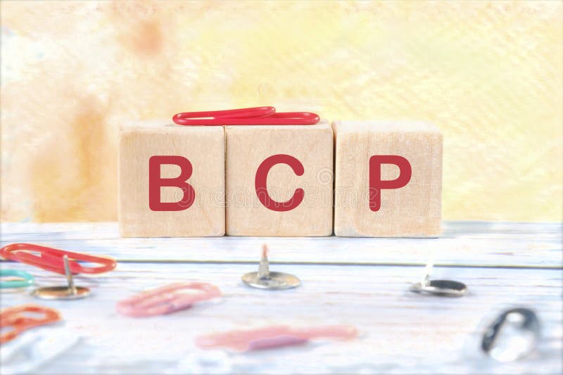 BCP Business Continuity Plan. BCP Assembled from Cubes on a Yellow ...