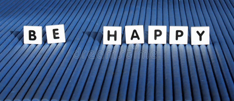 Be happy letter tiles stock photo. Image of life, close - 75688686