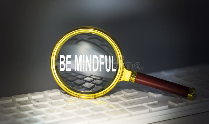 BE MINDFUL Word Concept on a Magnifier on the Keyboard Stock Photo ...