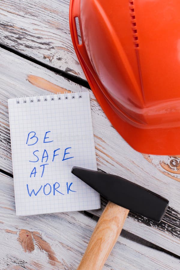 Be Safe at Work Note with Hammer and Helmet on Wood. Stock Image ...