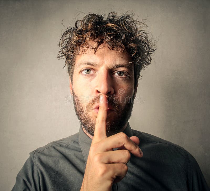 Man making silence gesture stock image. Image of young - 30964675