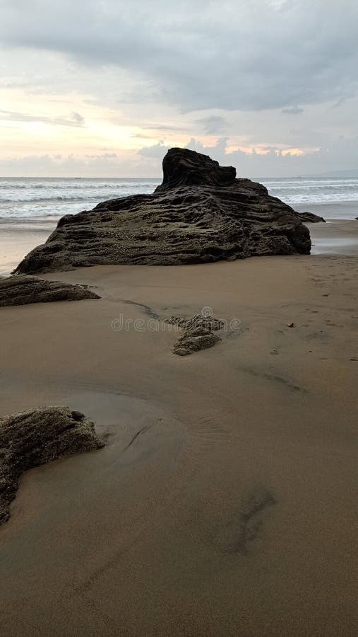 Always Be Strong Like a Stone Stock Image - Image of cliff, sand: 262150597