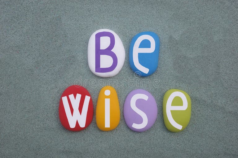 Be Wise, Creative Text Composed with Multi Colored Stone Letters Over ...
