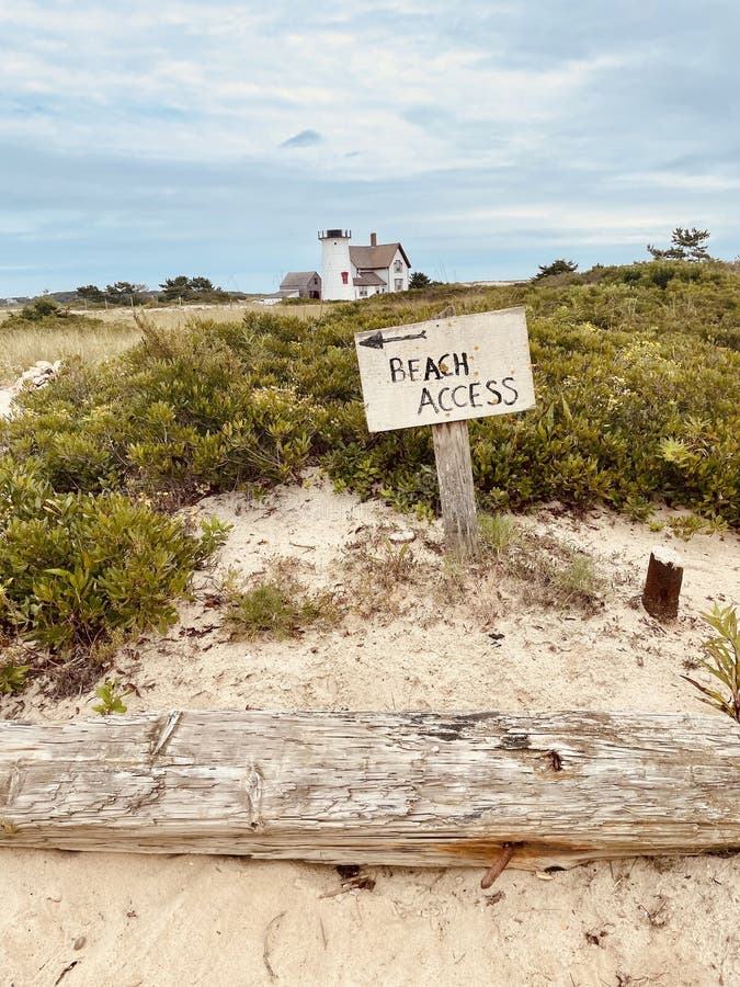 Beach access Lighthouse stock photo. Image of beach - 385289696