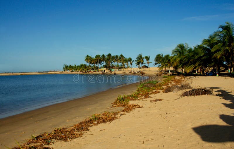 Beach at Ada Foah, Ghana stock image. Image of palm - 141364951