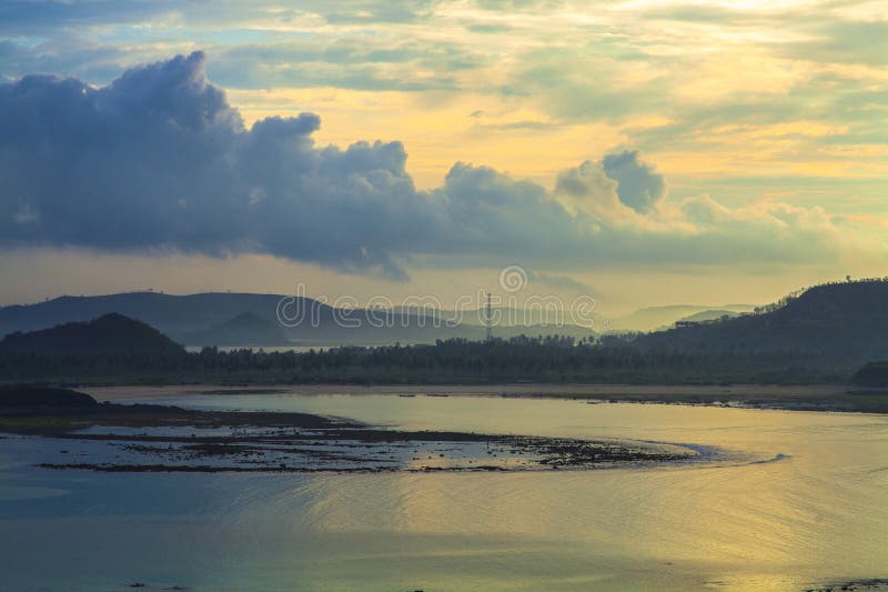 Beach Atmosphere with the Background of the Mountains during the ...