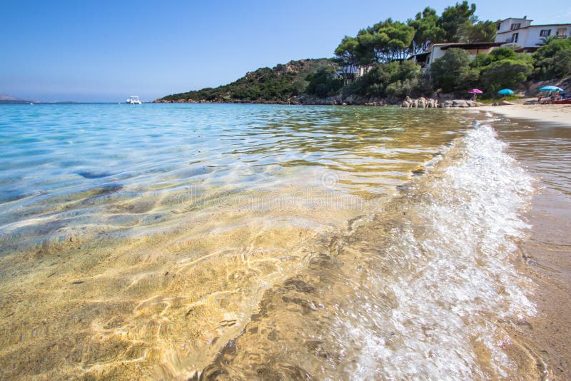The Beach at Baja Sardinia in Sardinia, Italy Stock Photo - Image of ...