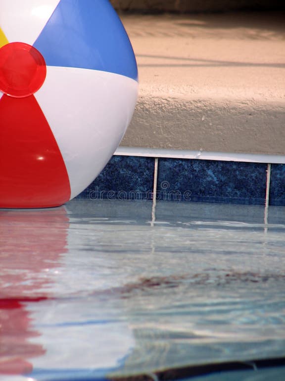 Beach Ball in the Pool stock photo. Image of reflections - 858768