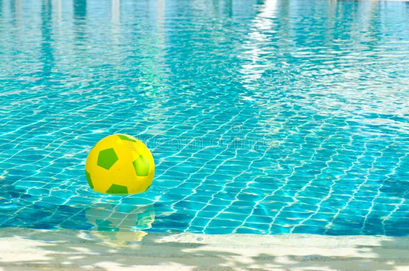 Beach Ball in Pool with Sun Reflection Stock Image - Image of color ...