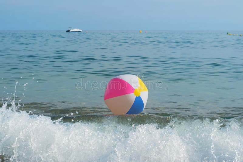 Beach ball in sea stock image. Image of ball, holidays - 76108515