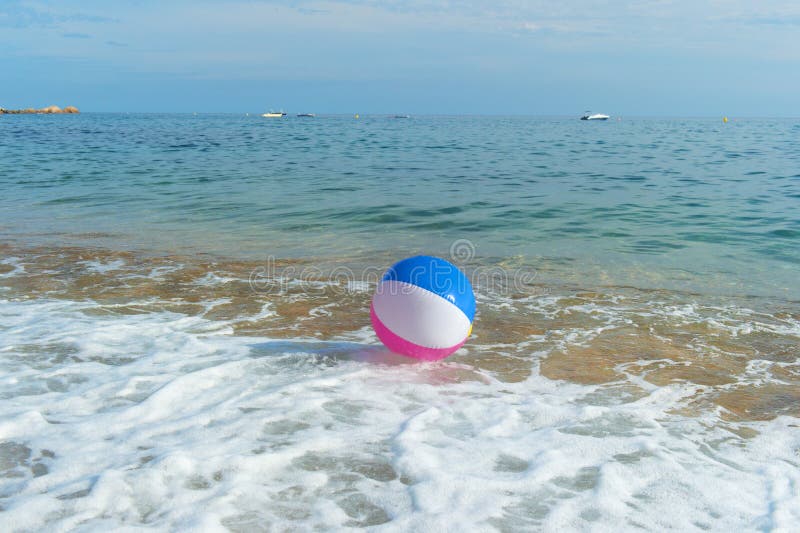 Beach ball in sea stock image. Image of ball, holidays - 76108515