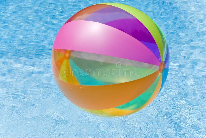 Beach Ball in Swimming Pool Stock Image - Image of floating, vibrant ...