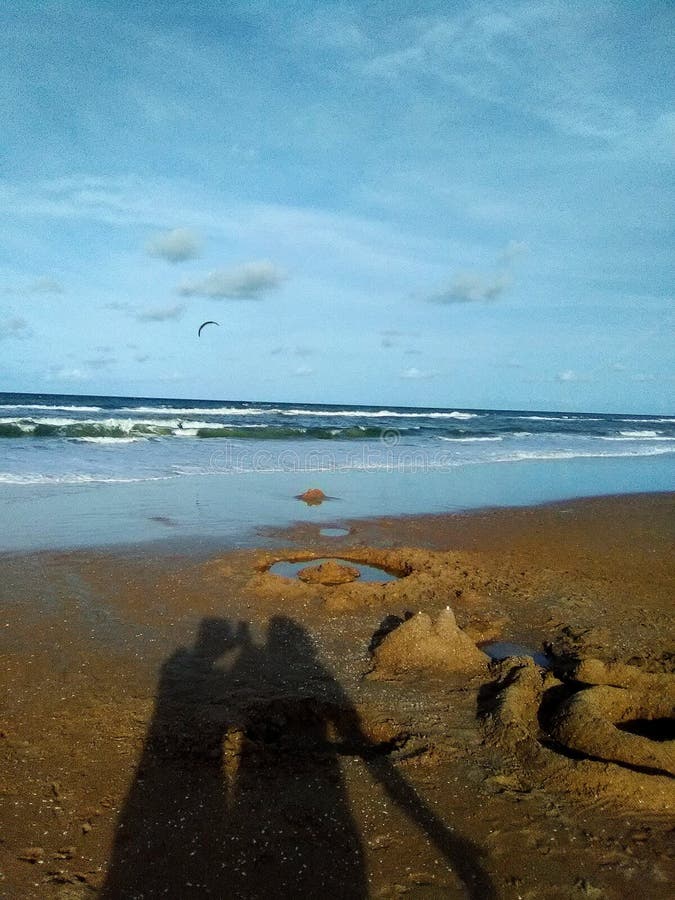 Beach stock photo. Image of ocean, shadow, beach, castle - 153835276