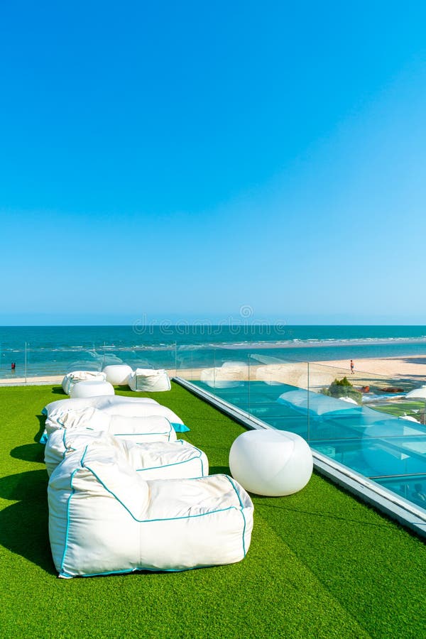 Bean Bag on Balcony with Sea Beach Background Stock Photo - Image of ...