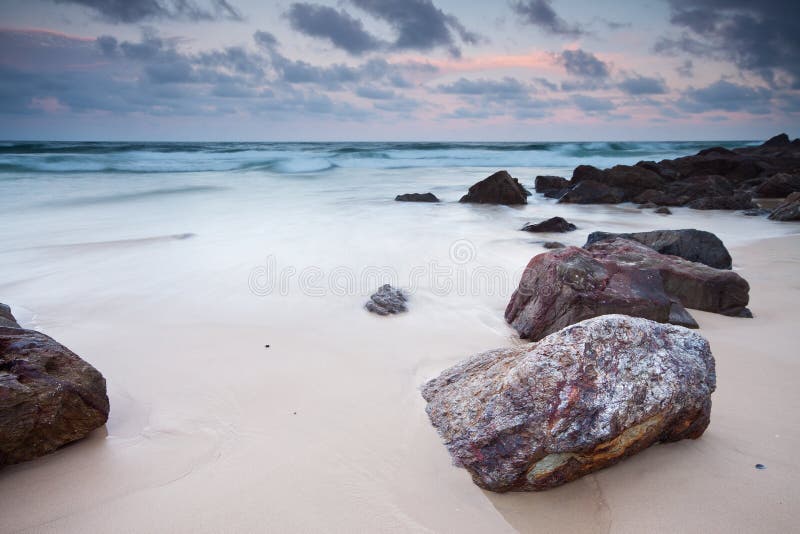 Rock on the Beach with Dramatic Sky on Square Form Stock Photo - Image ...