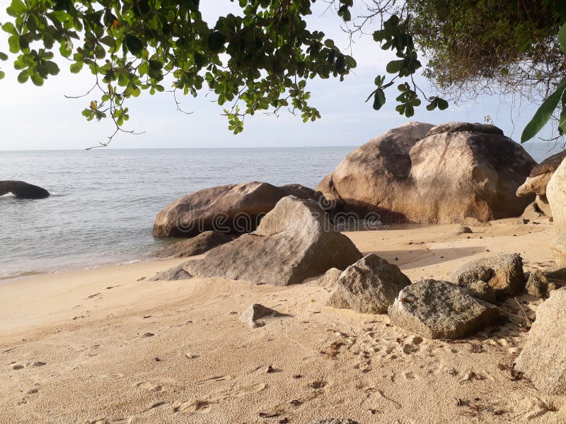Beach with big stone stock image. Image of sand, nature - 199568103