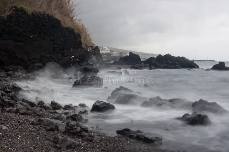 Beach of Black Sand with Rocks Stock Photo - Image of black, rock: 45395234