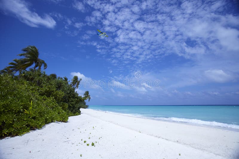 Beach and blue skies stock image. Image of white, cloud - 12280245