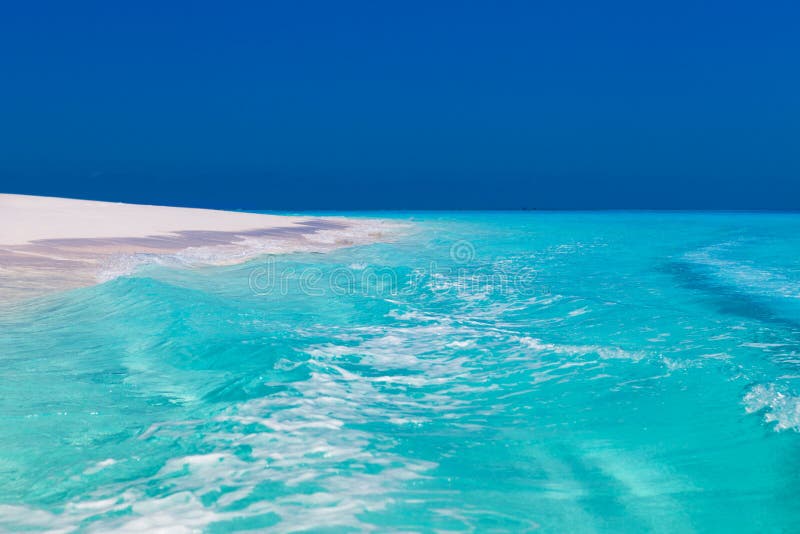 Beach and blue water stock image. Image of water, mnemba - 31385745