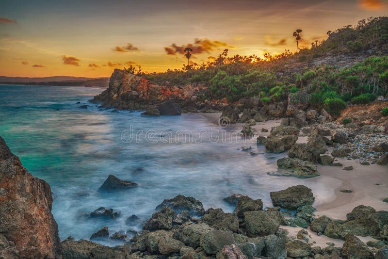 Beach and Boulder View at Sunset Stock Photo - Image of terrain, shore ...
