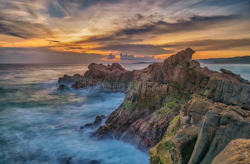 Beach and Boulder View at Sunset Stock Photo - Image of terrain, shore ...
