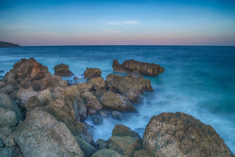 Beach and Boulder View at Sunset Stock Image - Image of water, cloud ...