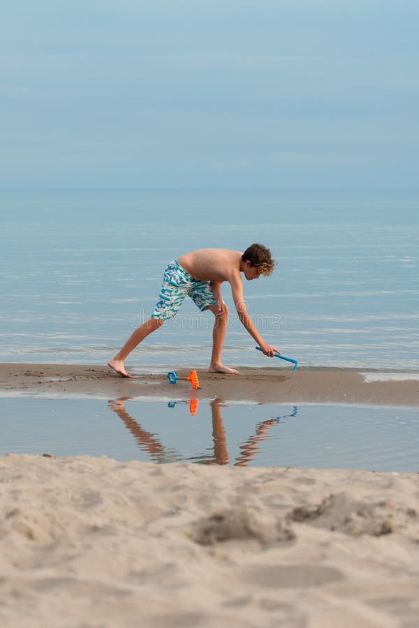 Beach boy stock image. Image of blue, childhood, canada - 74350269