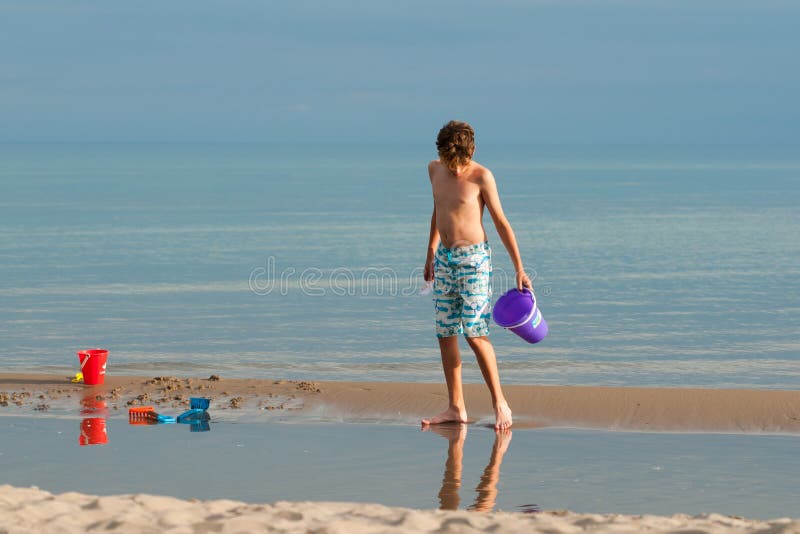 Beach boy stock photo. Image of blue, summertime, child - 74350282