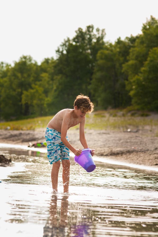 Beach boy stock image. Image of blue, childhood, canada - 74350269