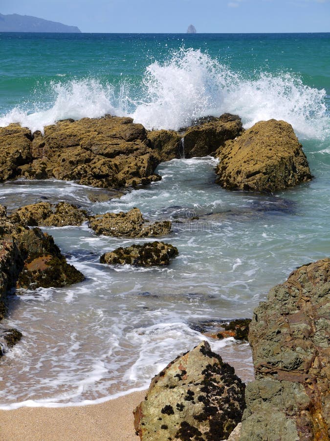 Beach: breaking waves rock stock photo. Image of island - 22607498
