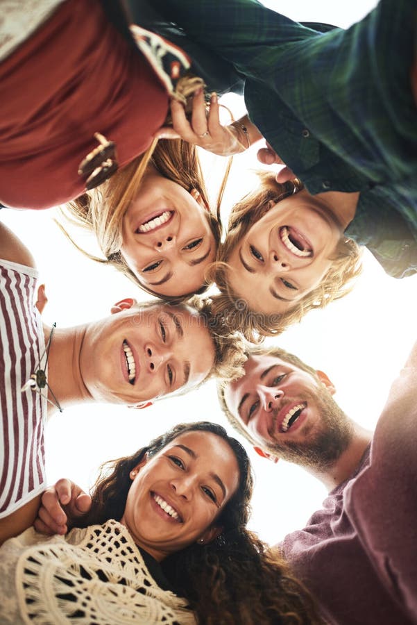 Beach Buddies. Low Angle Portrait of a Group of Friends Standing in a ...