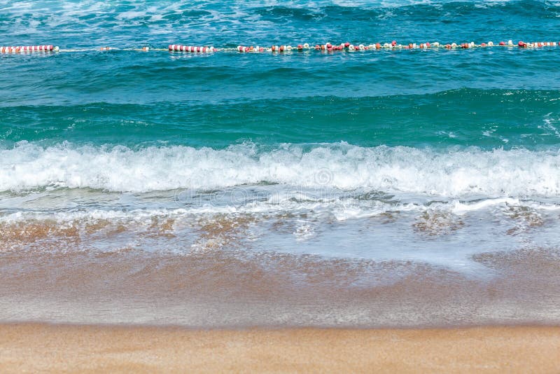 Beach and a buoy line stock image. Image of line, sand - 203836759